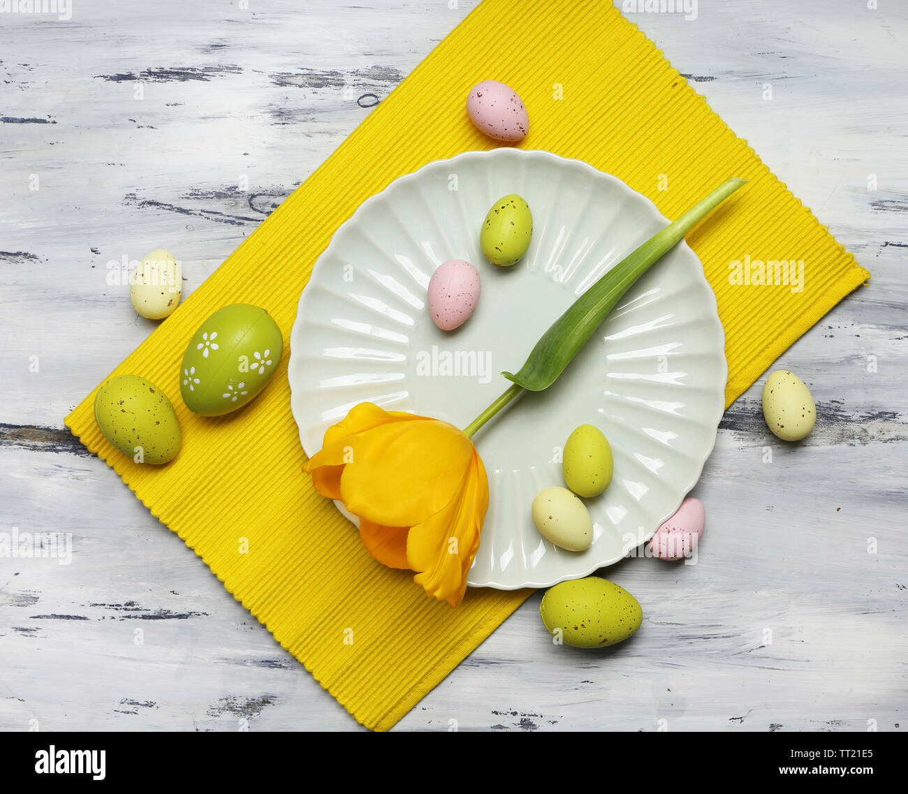 Easter table setting with tulips and eggs Stock Photo - Alamy