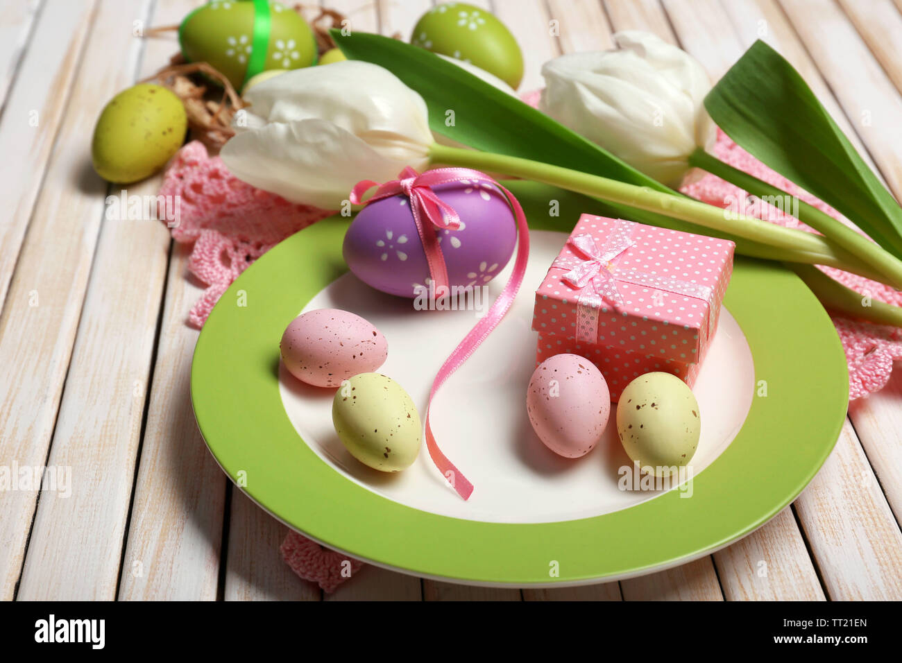 Easter table setting with tulips and eggs Stock Photo - Alamy