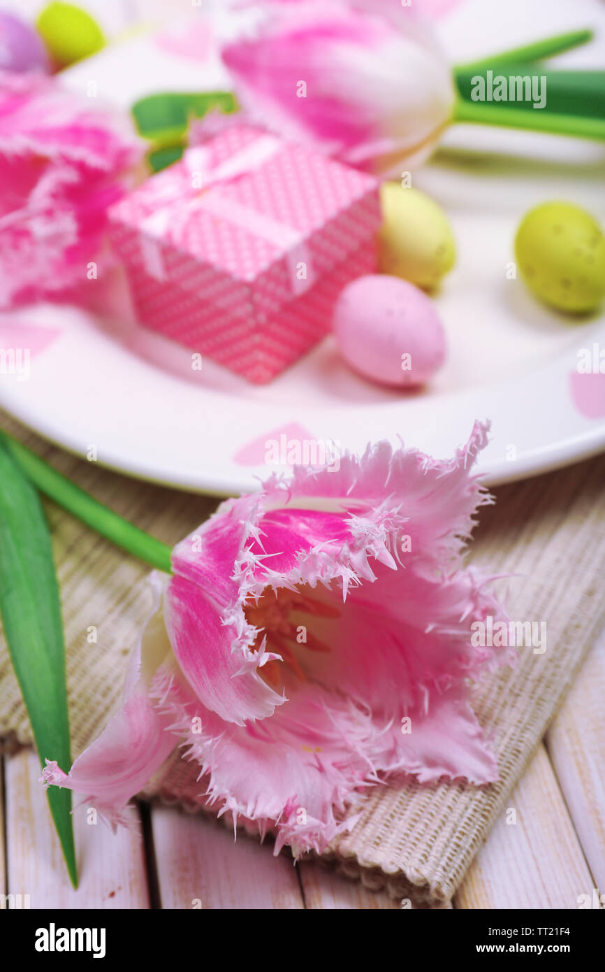Easter table setting with tulips and eggs Stock Photo - Alamy