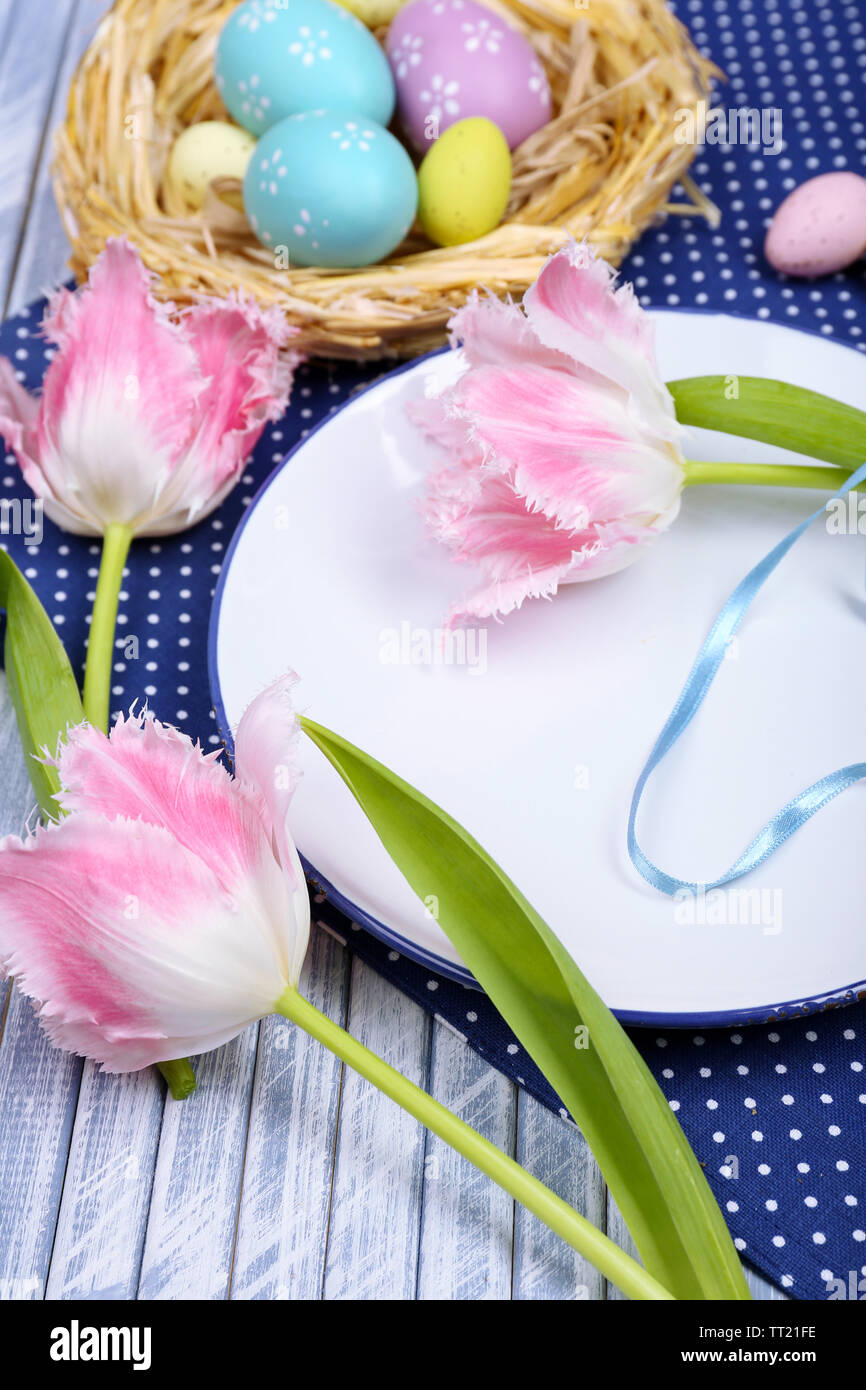 Easter table setting with tulips and eggs Stock Photo - Alamy