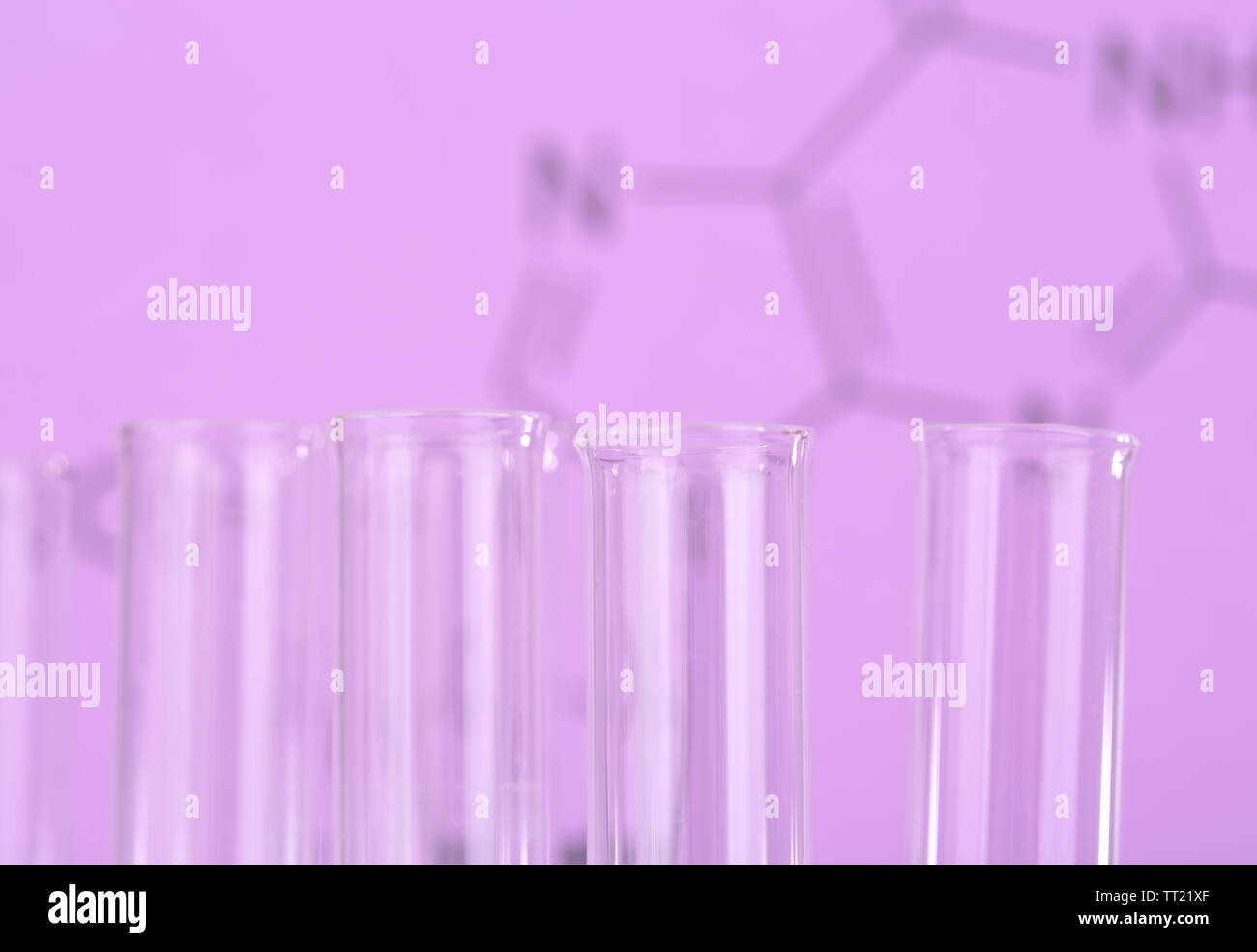 Test tube on written reaction formula background, close-up Stock Photo ...