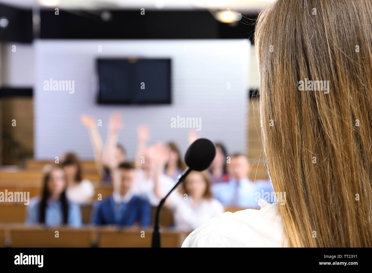 Businesswoman is making speech at conference room Stock Photo - Alamy