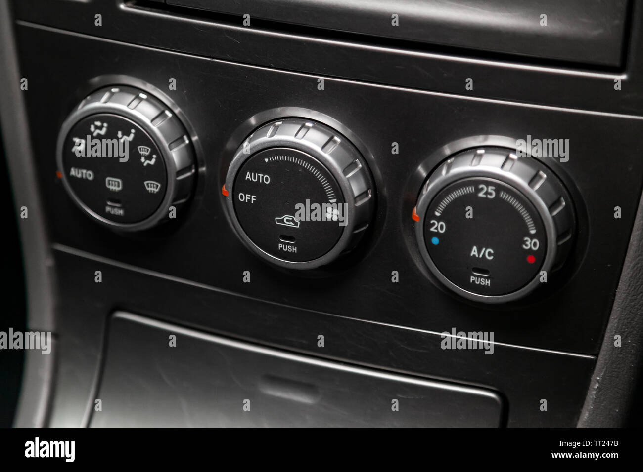 Сlose-up of the car black interior: adjustment of the blower, air ...