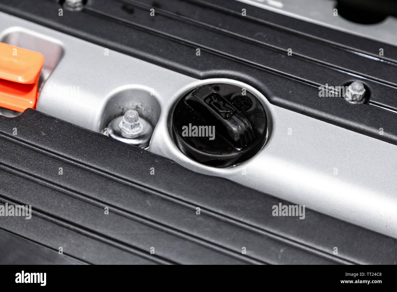 Close up of the oil filling plug in car engine compartment. Neck of ...