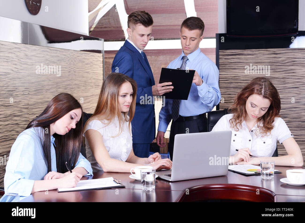 Business people working in conference room Stock Photo - Alamy