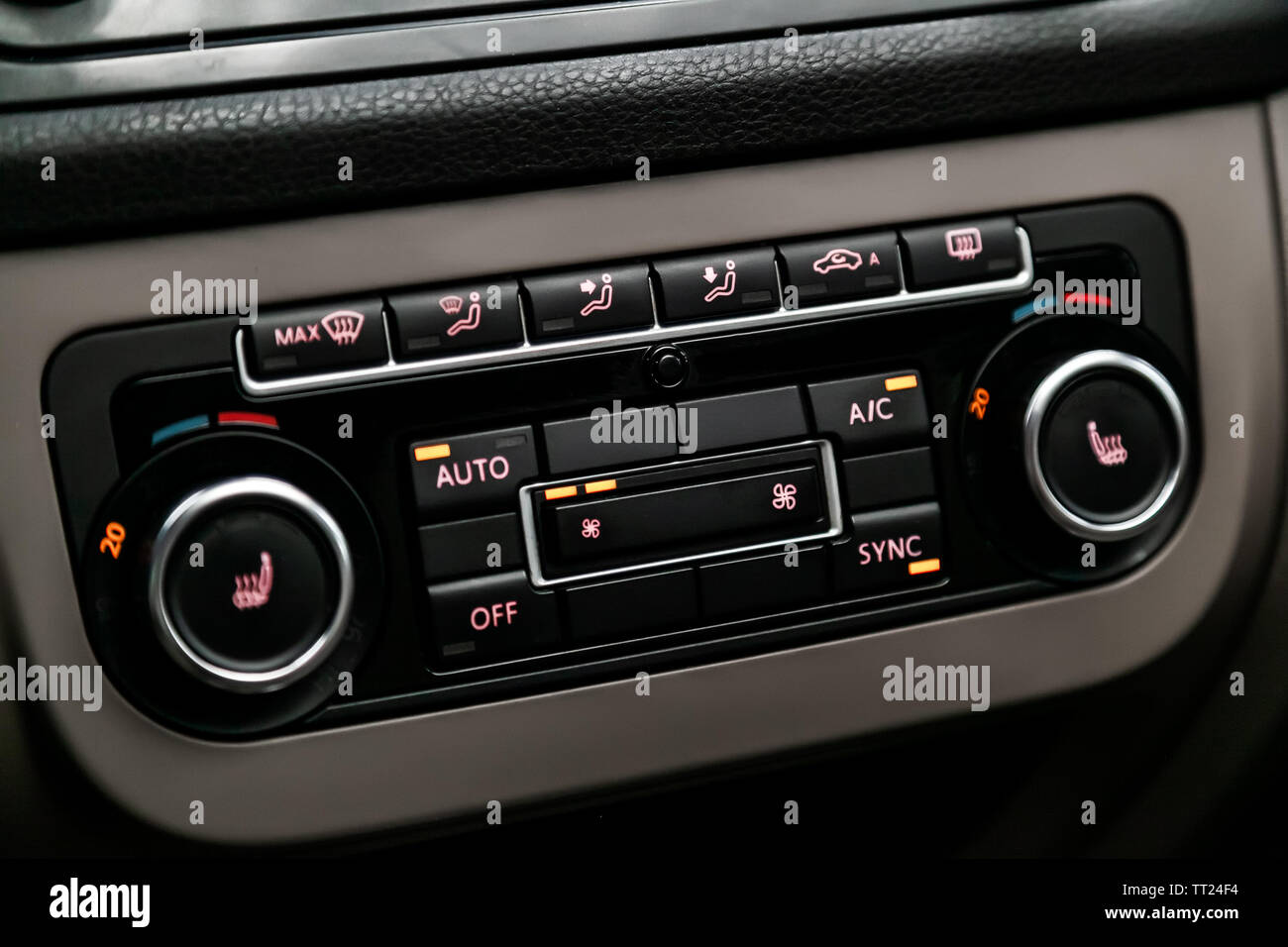 Сlose-up of the car black interior: seat heatting buttons, adjustment ...