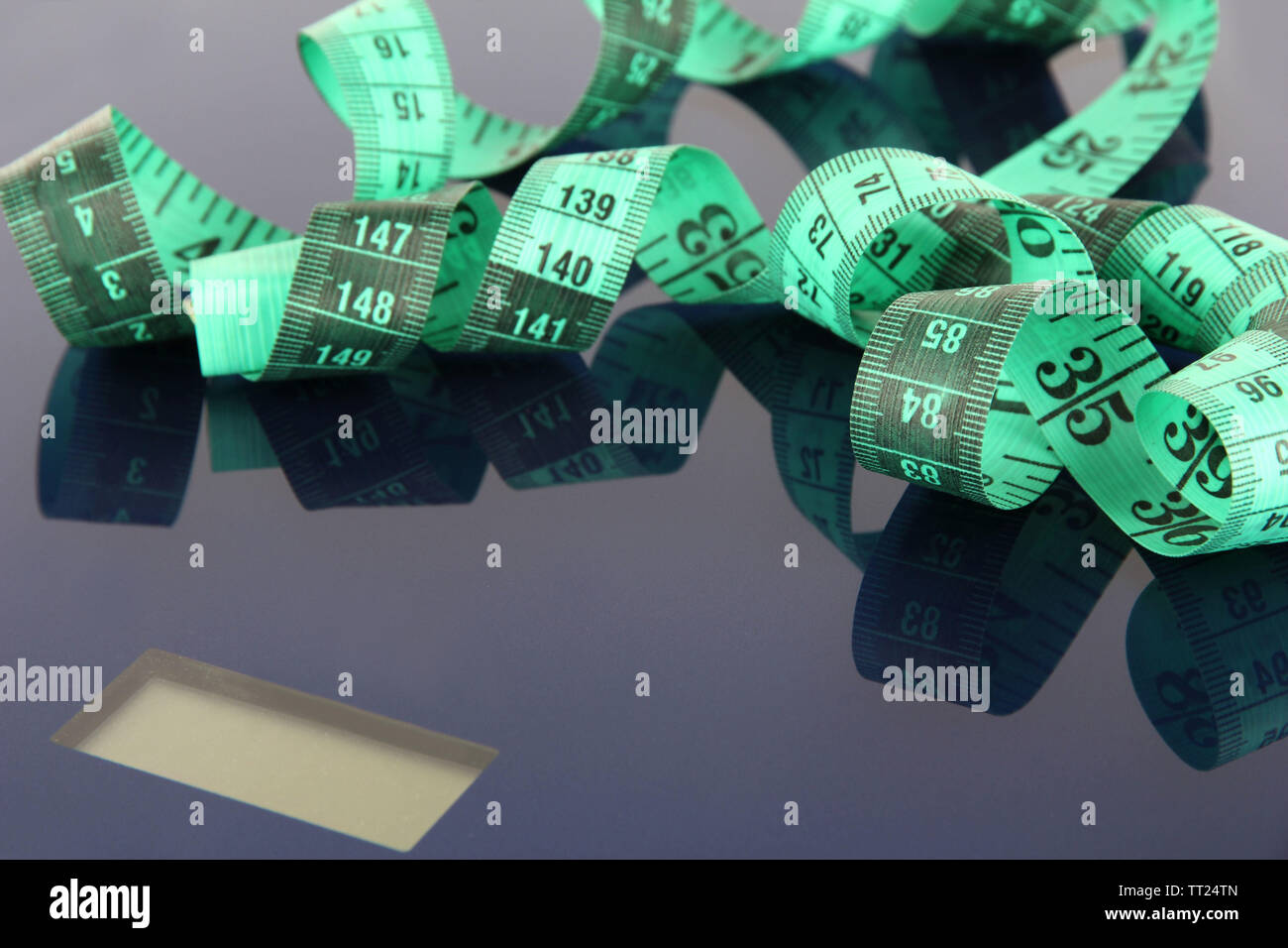 Measuring tape and scales close-up Stock Photo - Alamy