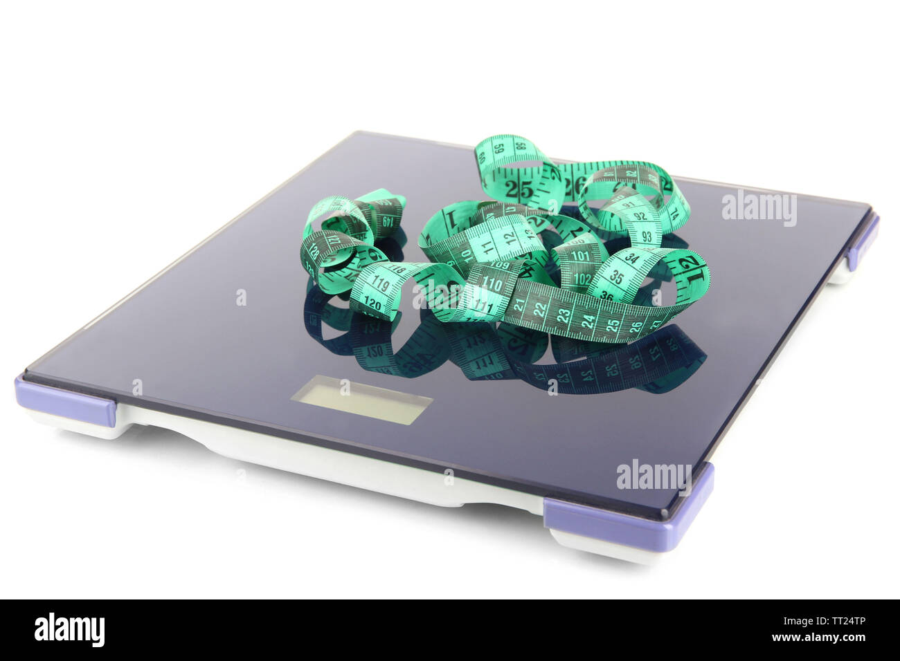 Measuring tape and scales isolated on white Stock Photo - Alamy