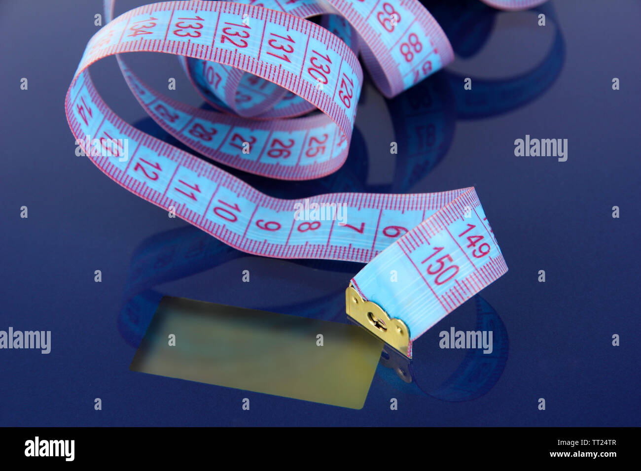 Measuring tape and scales close-up Stock Photo - Alamy