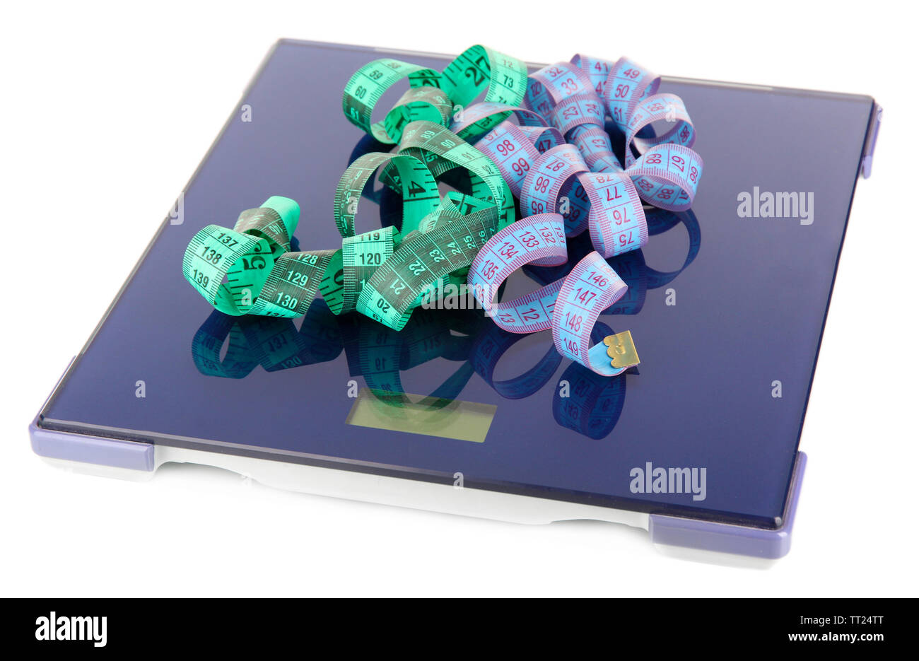 Measuring tape and scales isolated on white Stock Photo - Alamy