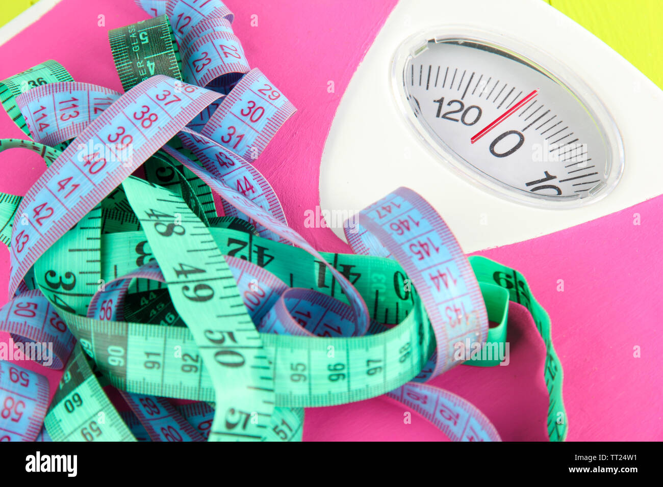Measuring tape and scales close-up Stock Photo - Alamy