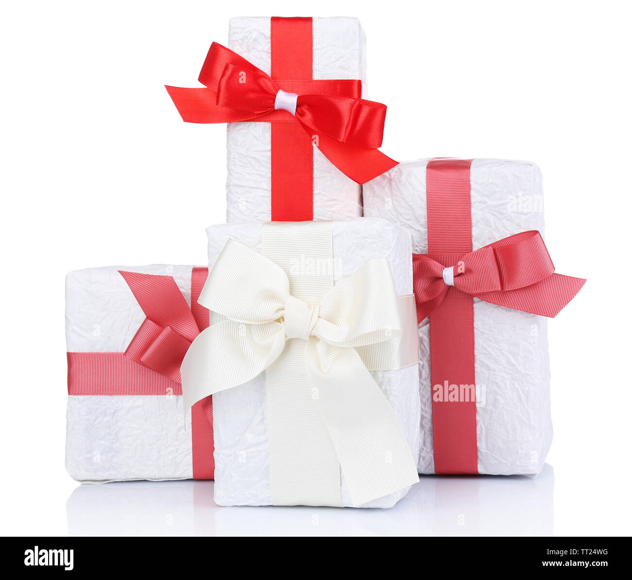 Beautiful gifts with red ribbons, isolated on white Stock Photo - Alamy