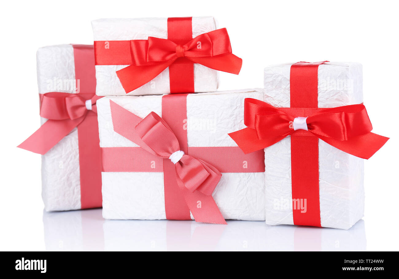 Beautiful gifts with red ribbons, isolated on white Stock Photo - Alamy