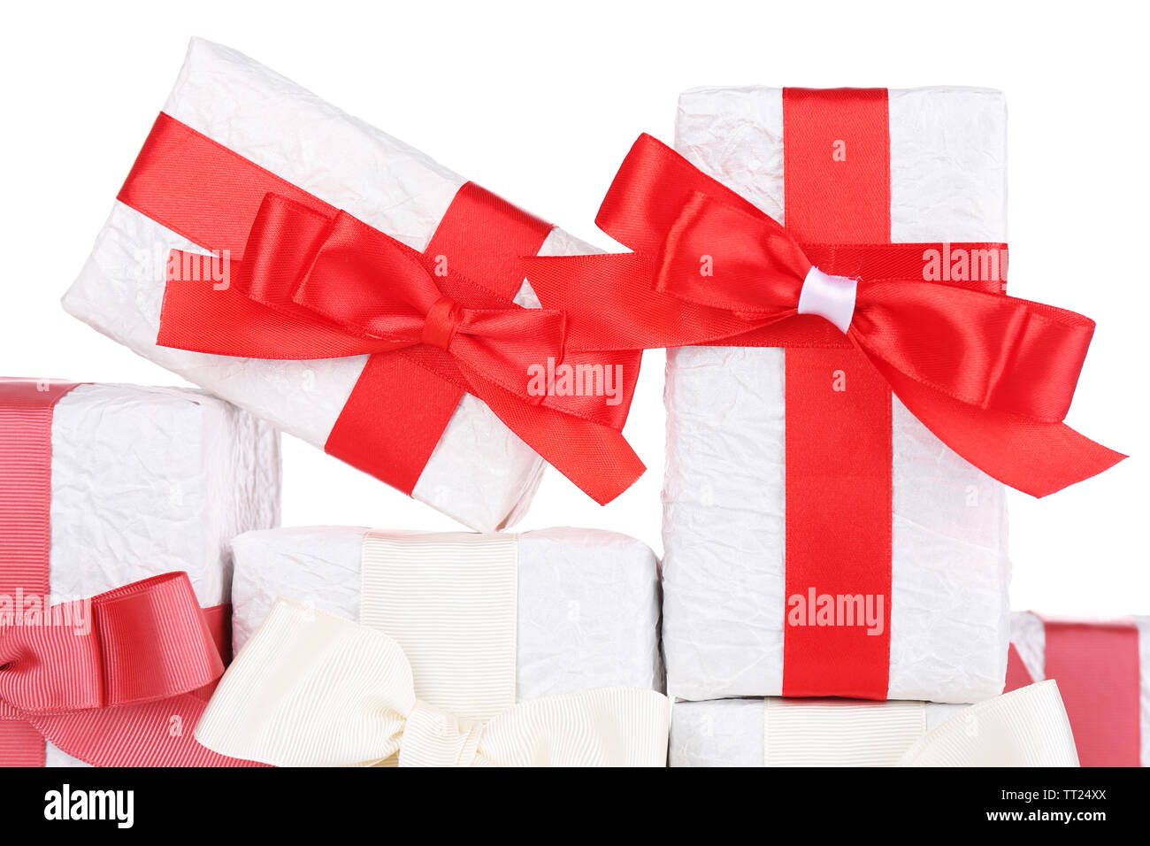 Beautiful gifts with red ribbons, isolated on white Stock Photo - Alamy