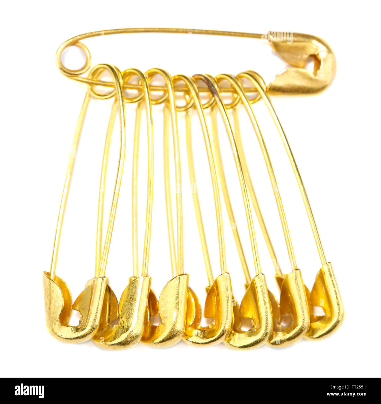 Gold safety pins hi-res stock photography and images - Alamy