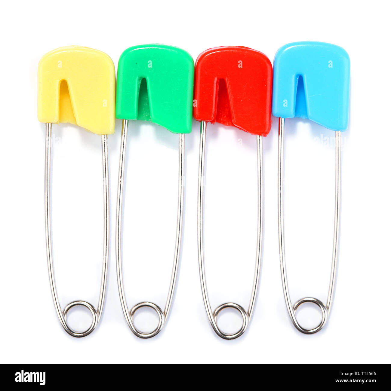 Multicolor safety pins isolated on white Stock Photo - Alamy