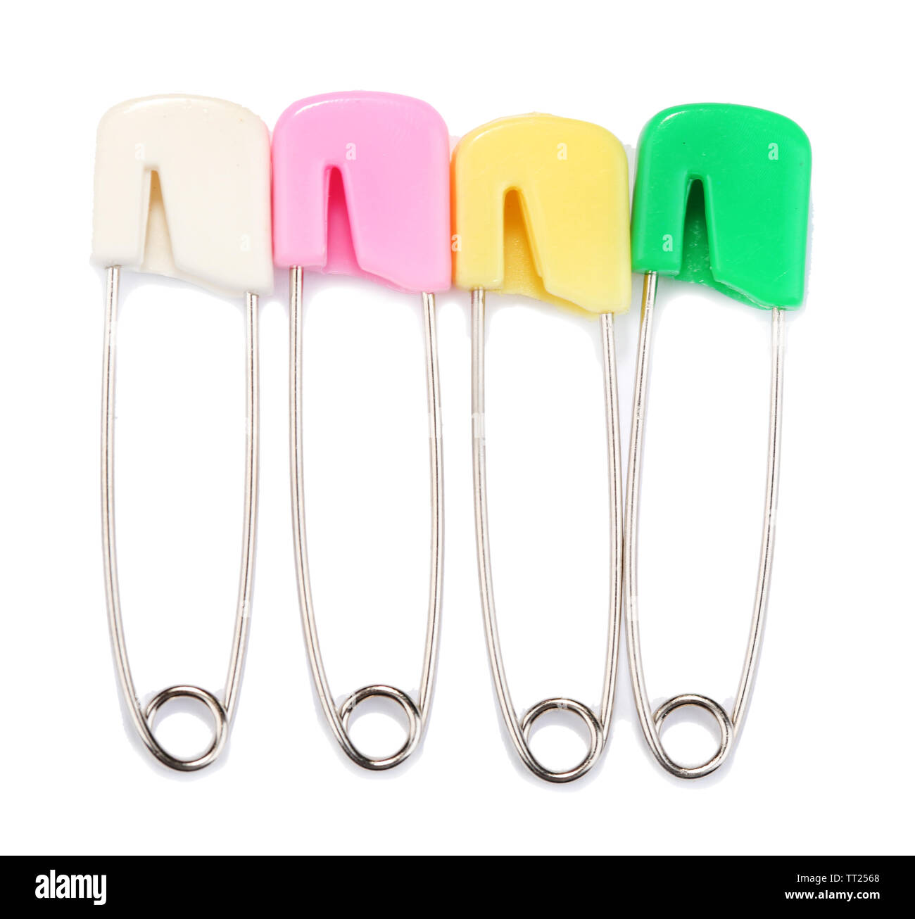 Multicolor safety pins isolated on white Stock Photo - Alamy