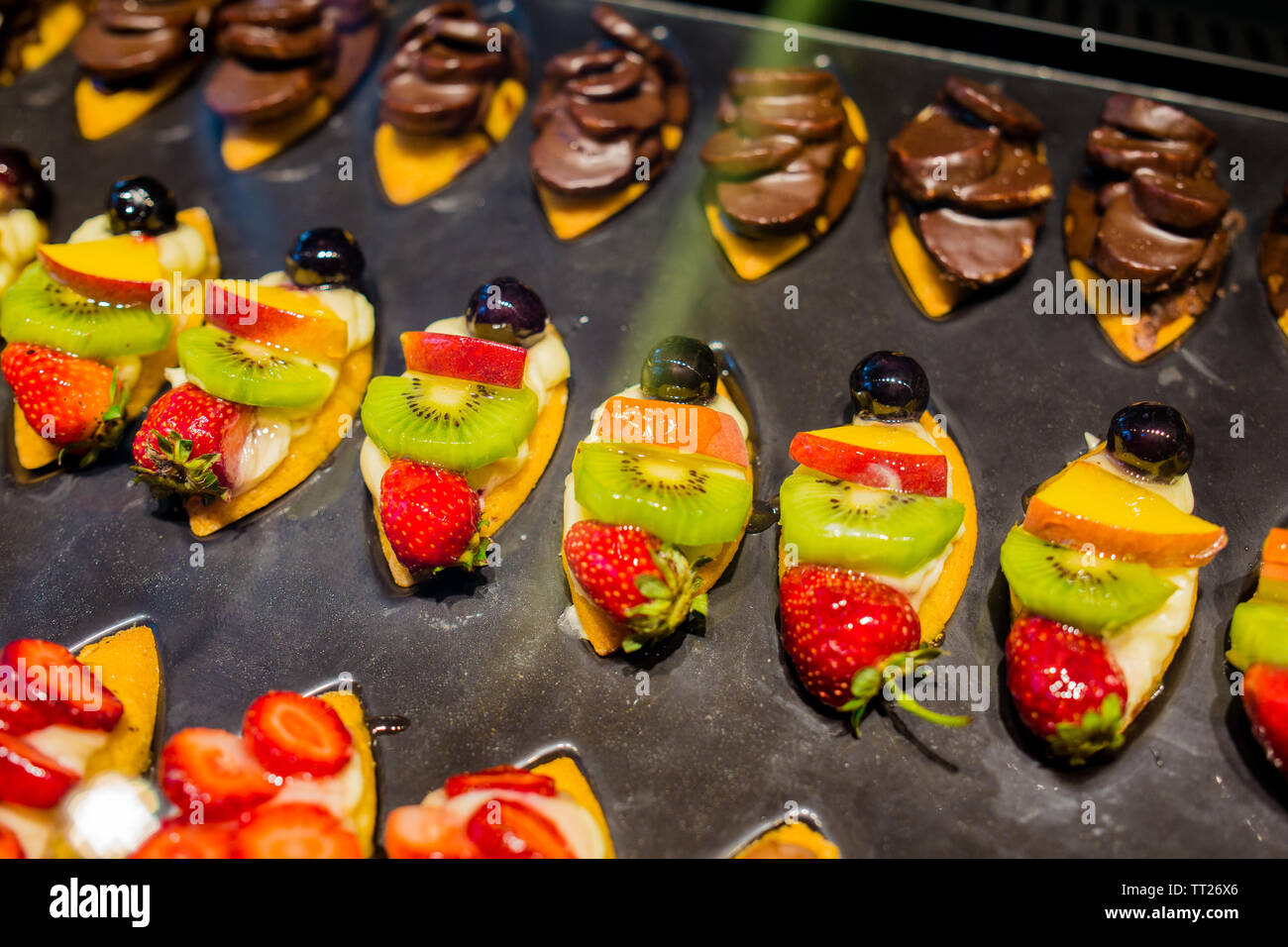 cupcakes fruit tops macro Stock Photo - Alamy