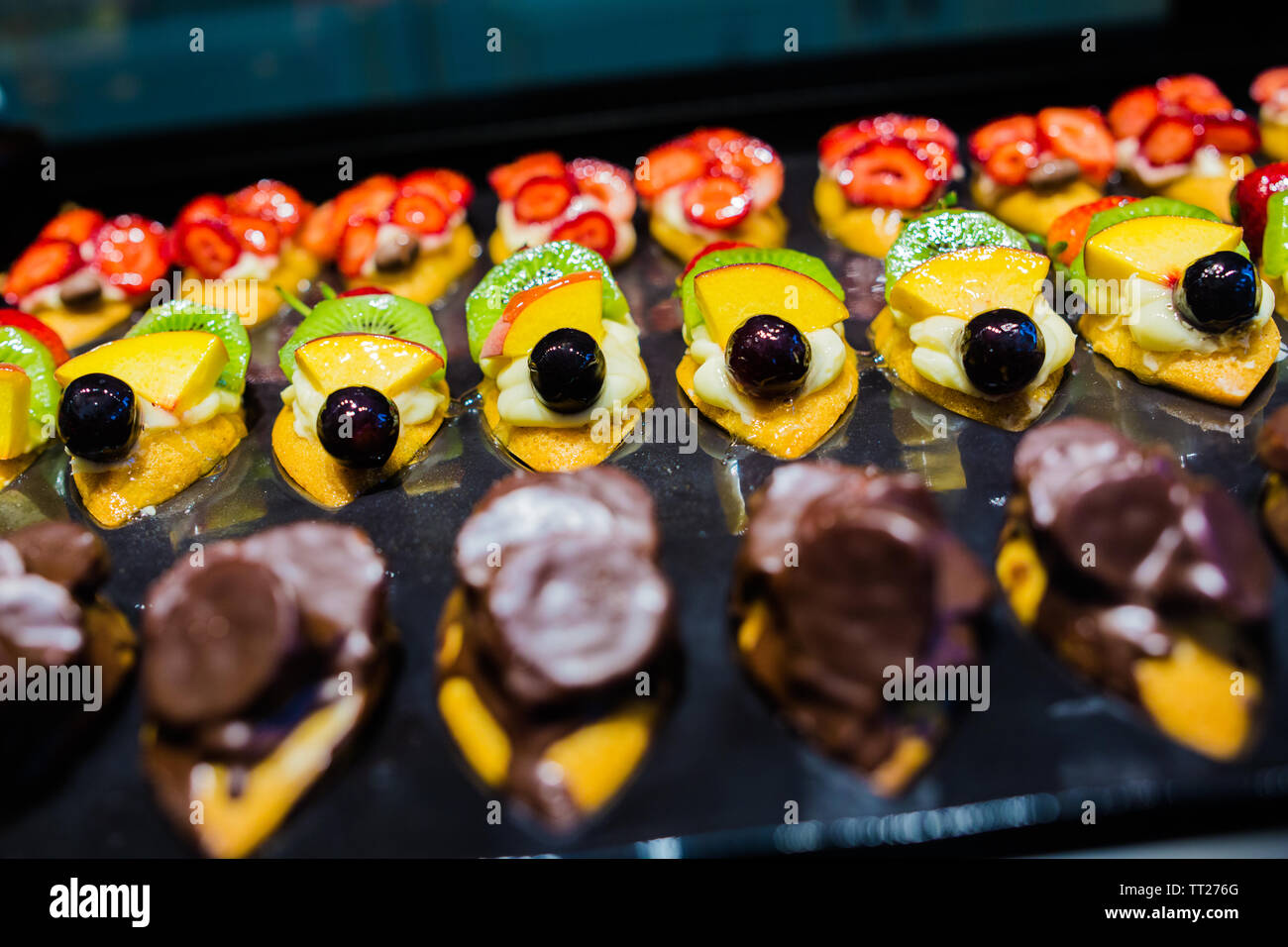 cupcakes fruit tops macro Stock Photo - Alamy