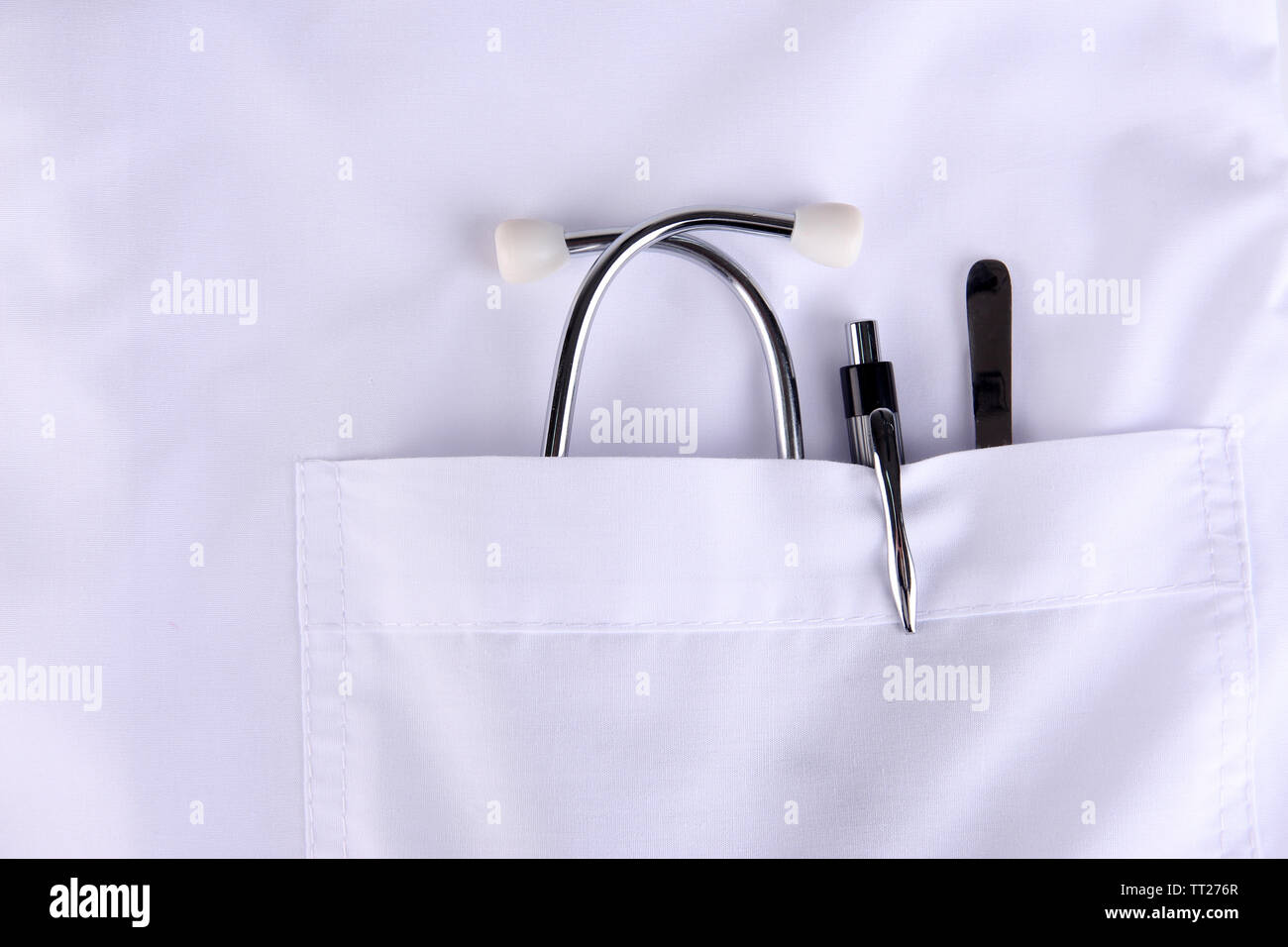 Doctor pocket with pen, stethoscope and other equipment, close-up Stock ...