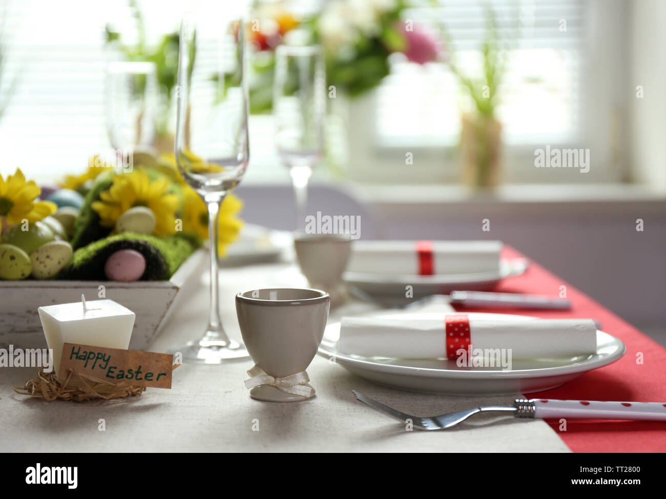 Beautiful holiday Easter table setting Stock Photo - Alamy