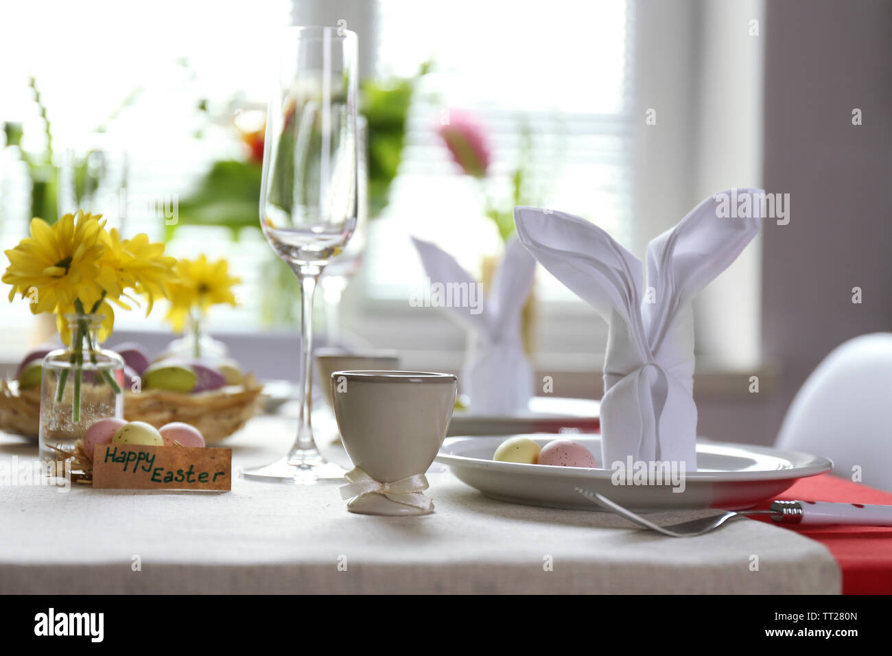 Beautiful holiday Easter table setting Stock Photo - Alamy