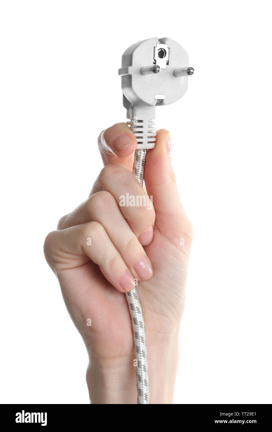 Hand holding electric plug isolated on white Stock Photo - Alamy