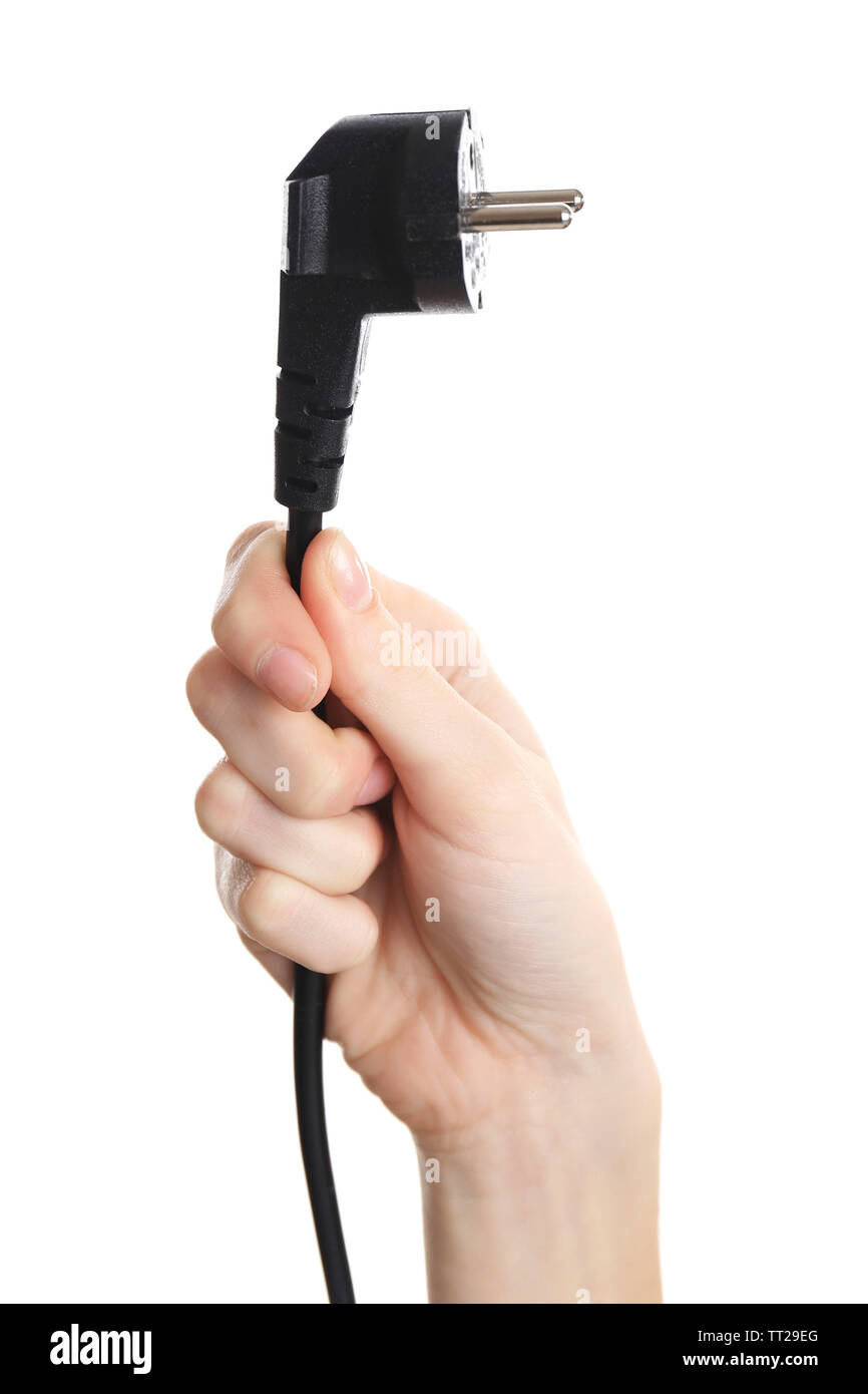 Hand holding electric plug isolated on white Stock Photo - Alamy
