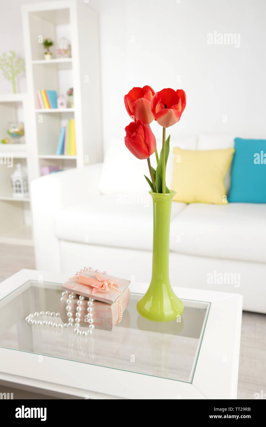 Beautiful spring flowers in vase on home interior background Stock ...