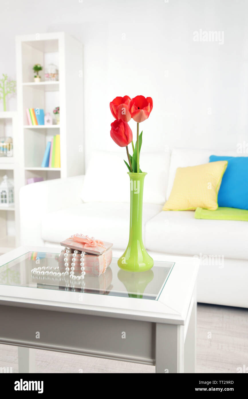 Beautiful spring flowers in vase on home interior background Stock ...