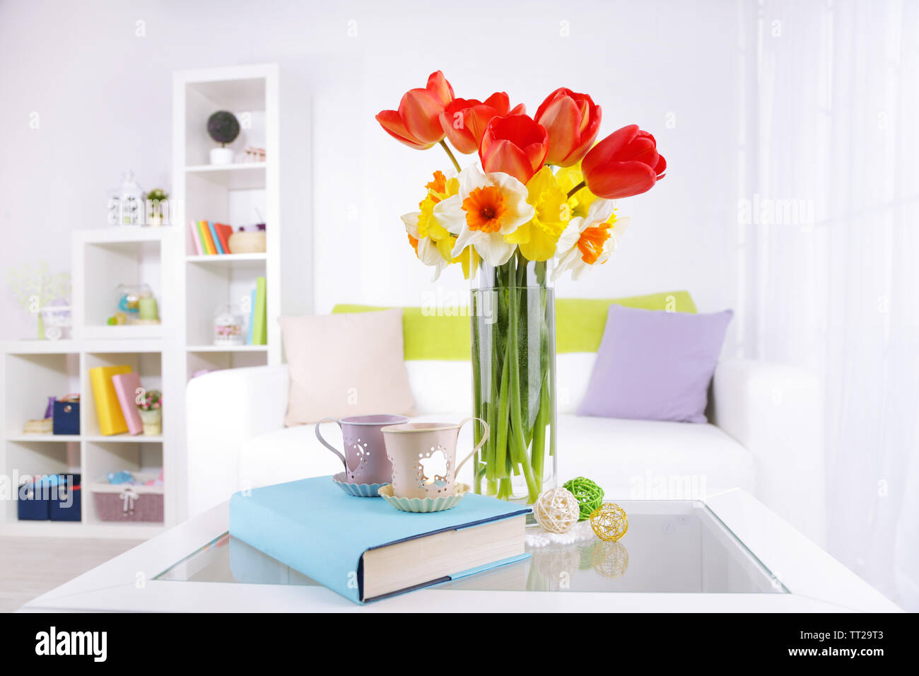 Beautiful spring flowers in vase on home interior background Stock ...