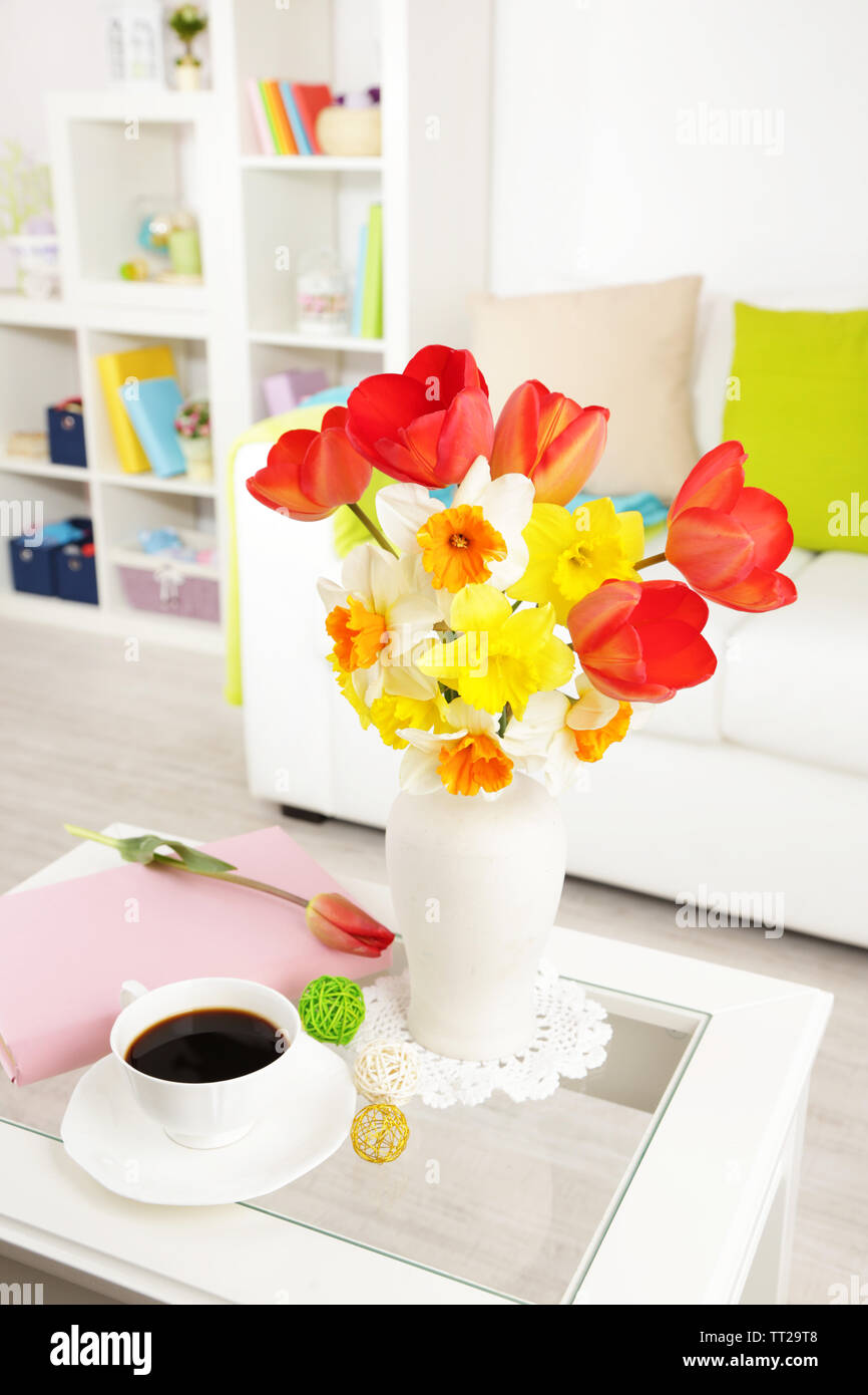 Beautiful spring flowers in vase on home interior background Stock ...