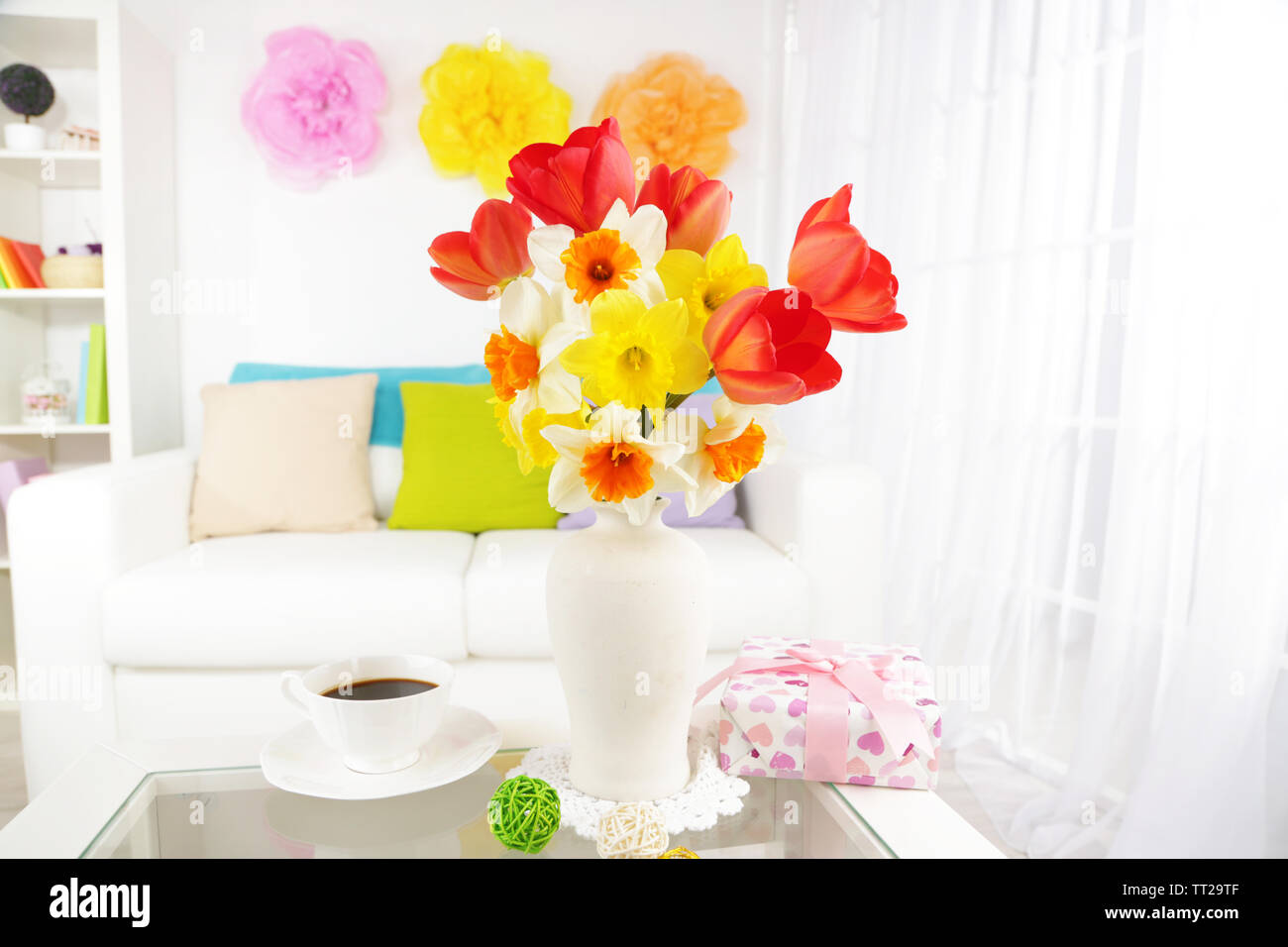 Beautiful spring flowers in vase on home interior background Stock ...
