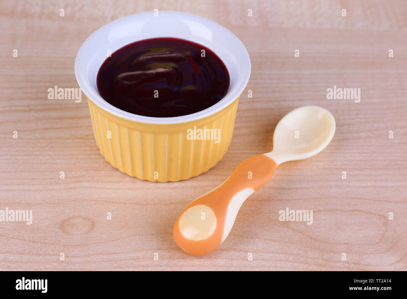 Baby food on wooden table Stock Photo - Alamy