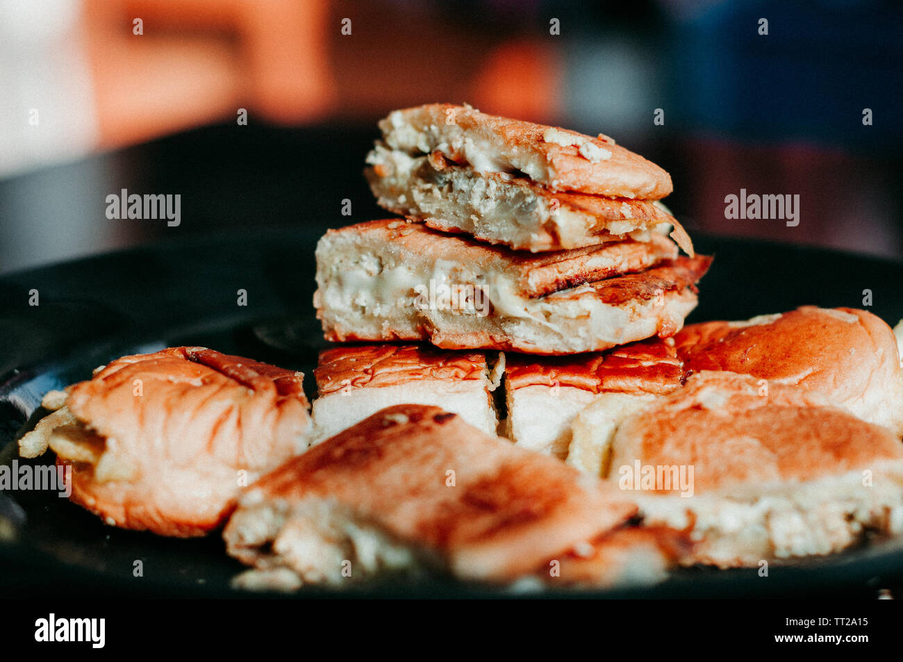 Close up of Malaysian well known food "Roti John" on a dark background ...