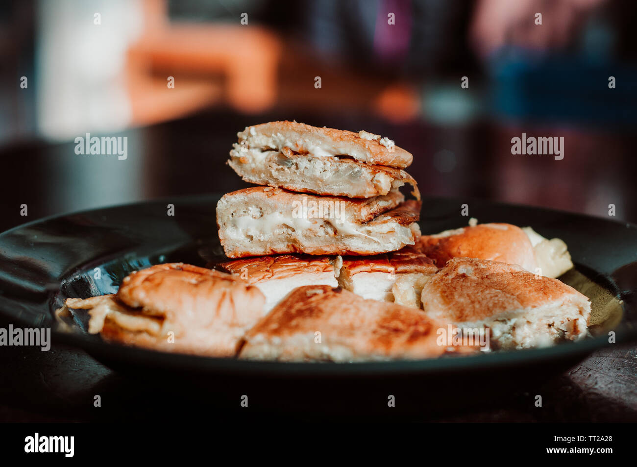 Close up of Malaysian well known food "Roti John" on a dark background ...