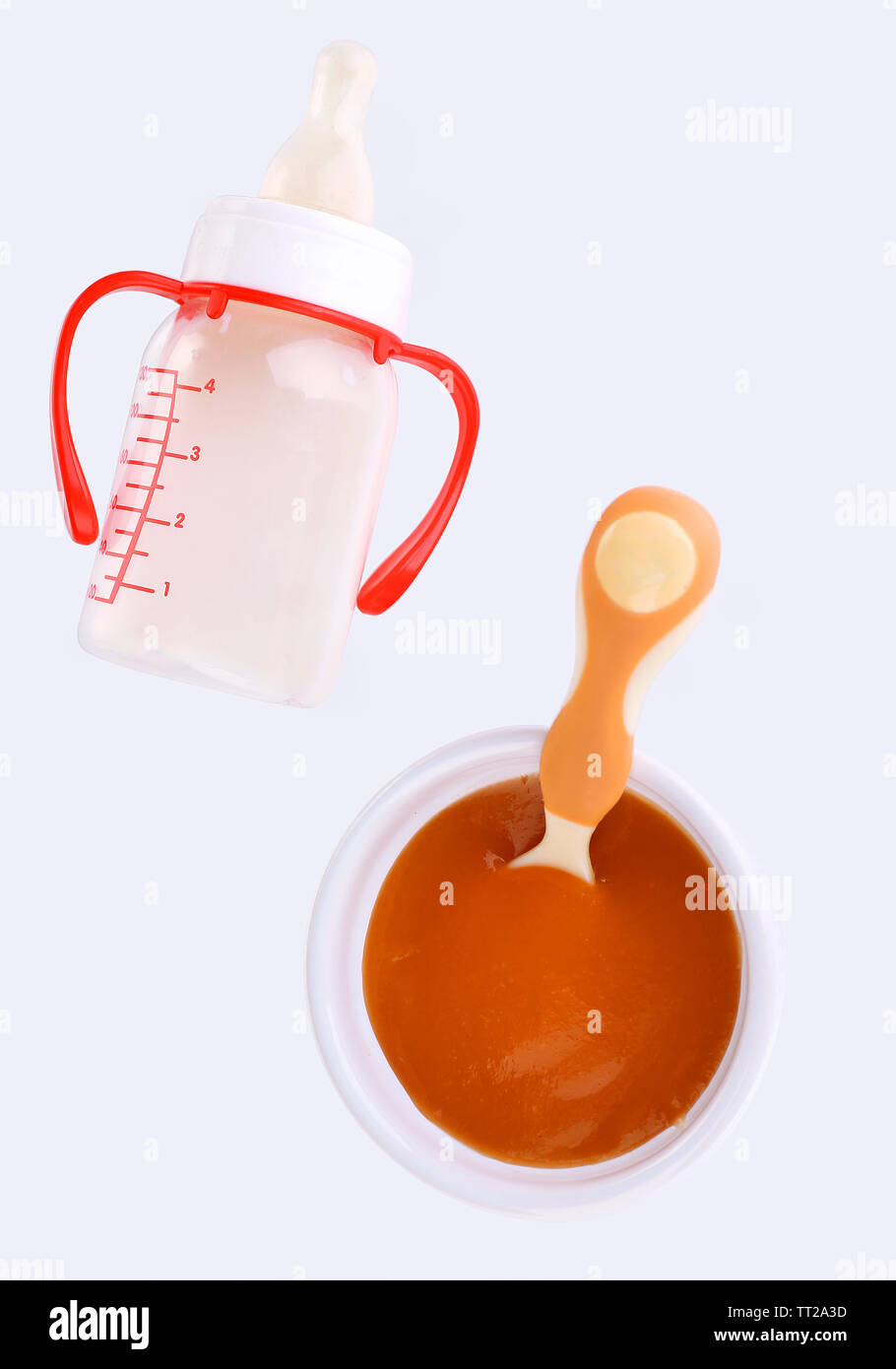 Baby food and milk isolated on white Stock Photo - Alamy