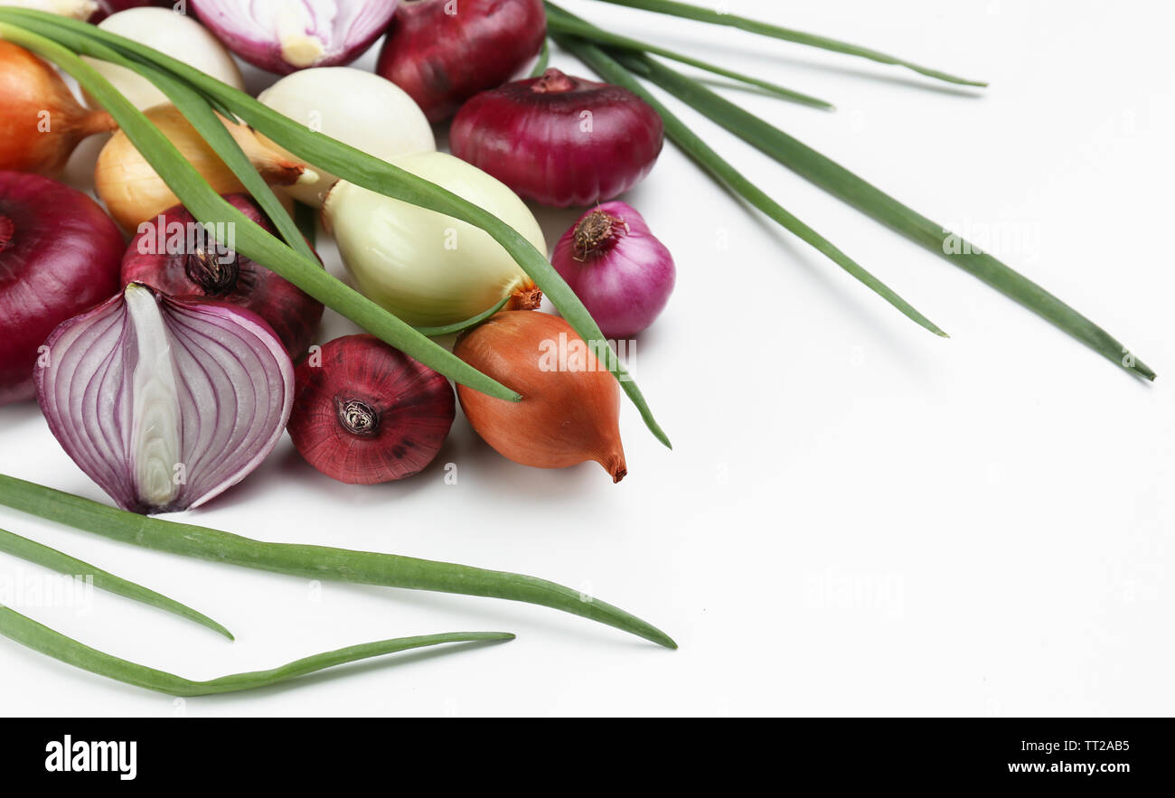 Different raw onion, isolated on white Stock Photo - Alamy