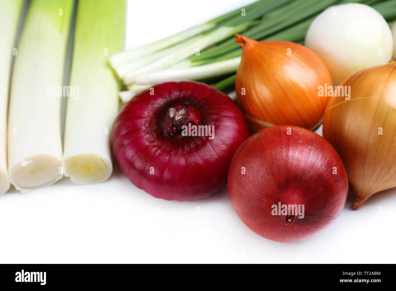 Different raw onion, isolated on white Stock Photo - Alamy