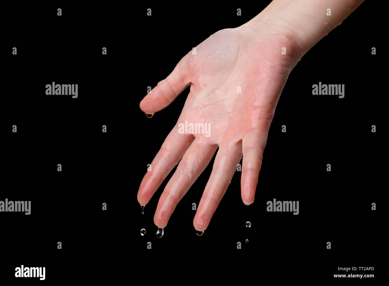 Human hand with water splashing on them on black background Stock Photo ...