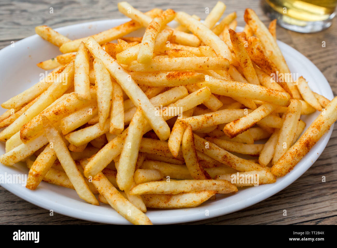 fried potatoes and beer on pub table Stock Photo - Alamy
