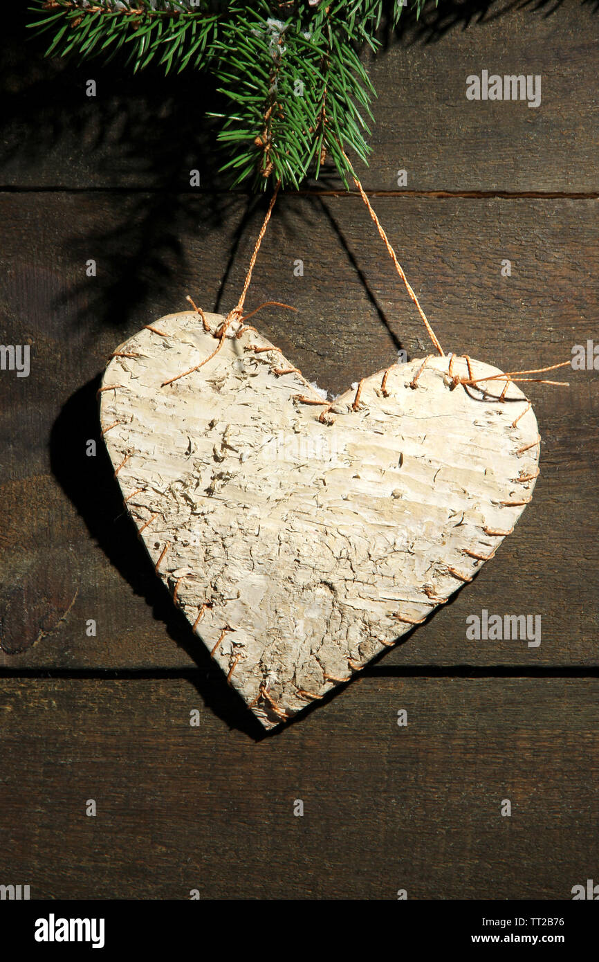Decorative heart on rope, on wooden background Stock Photo - Alamy