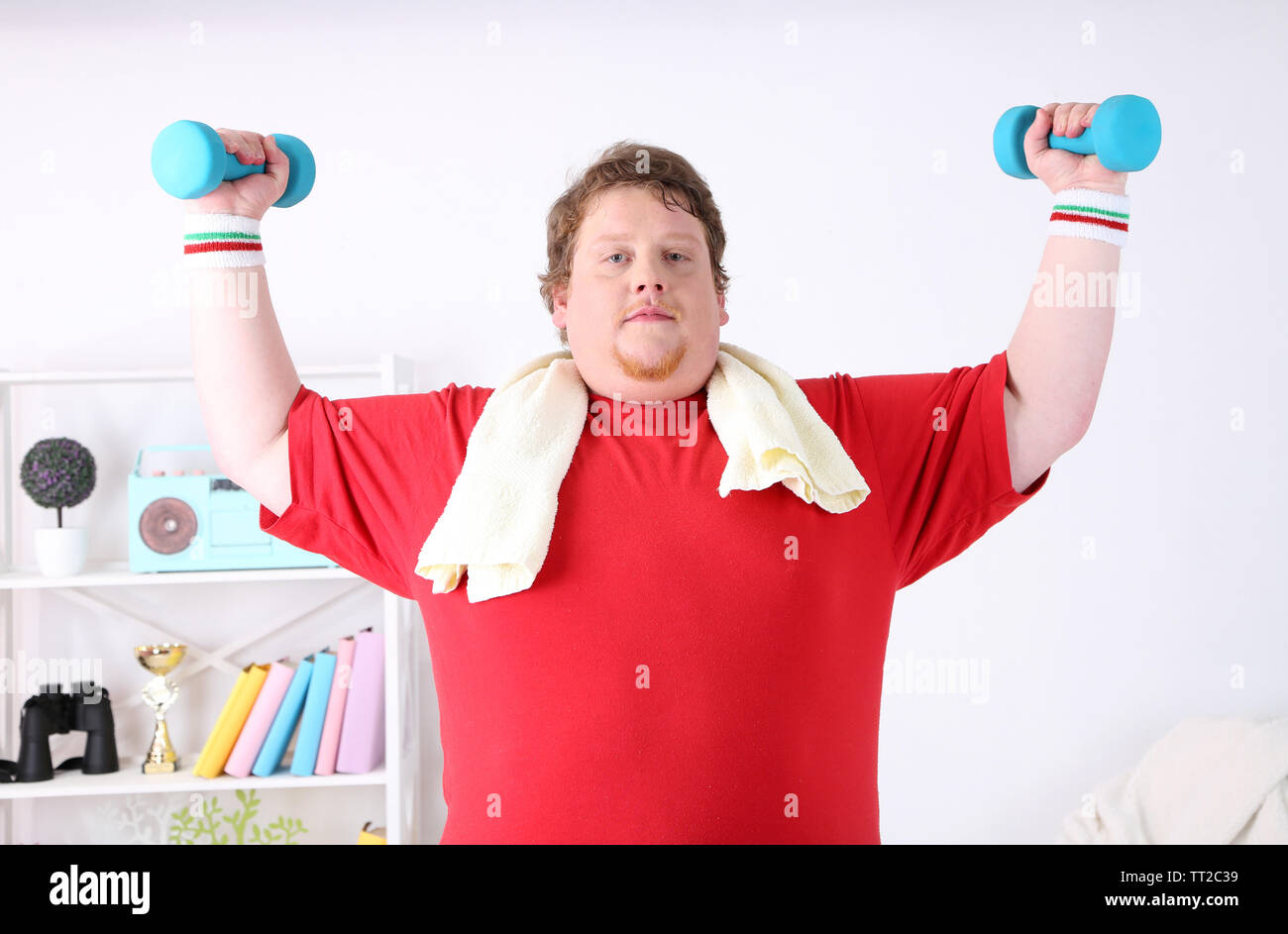 Large fitness man working out at home Stock Photo - Alamy