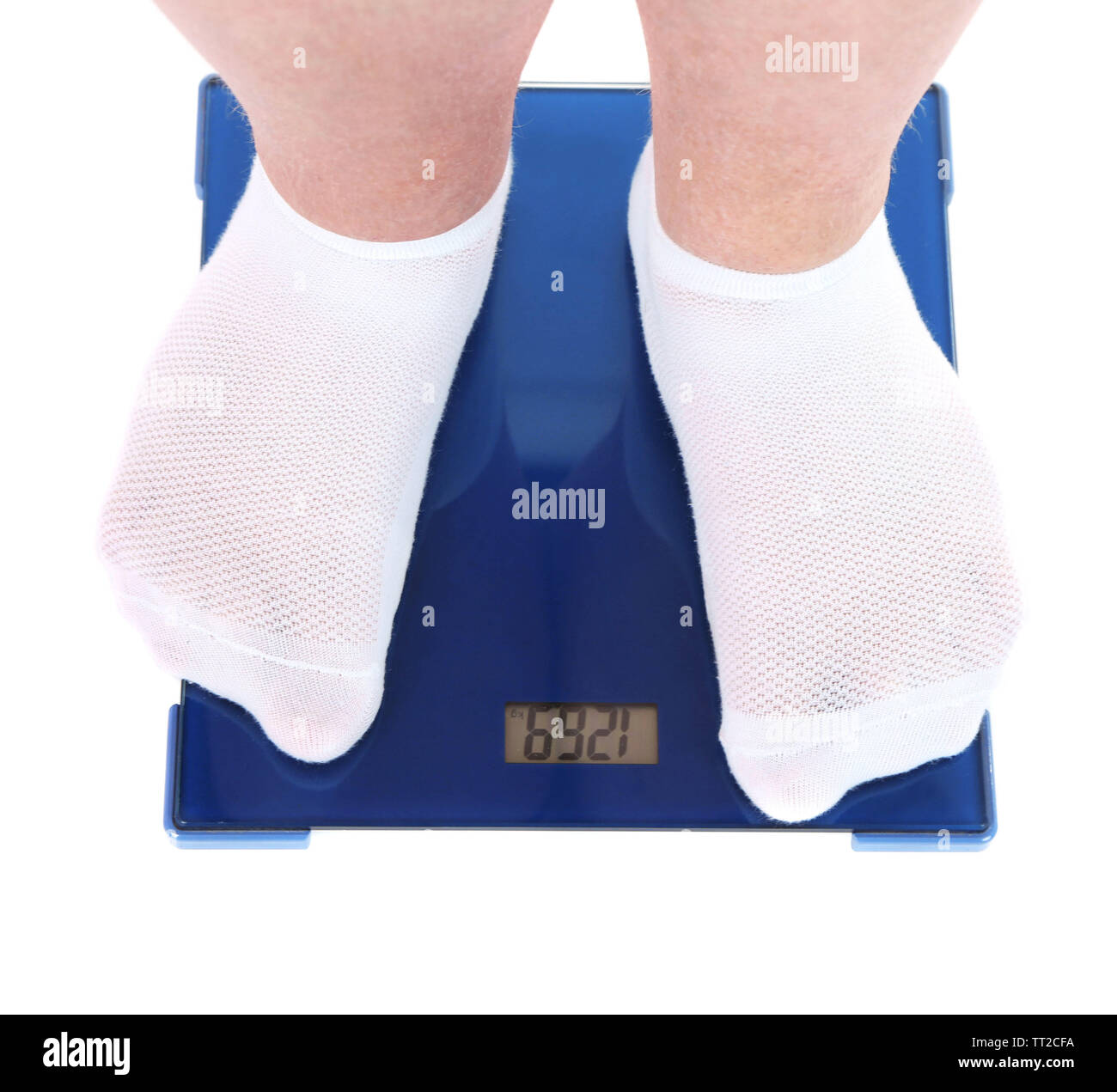 Fat man standing on electronic scales . Conceptual photo of weight loss ...