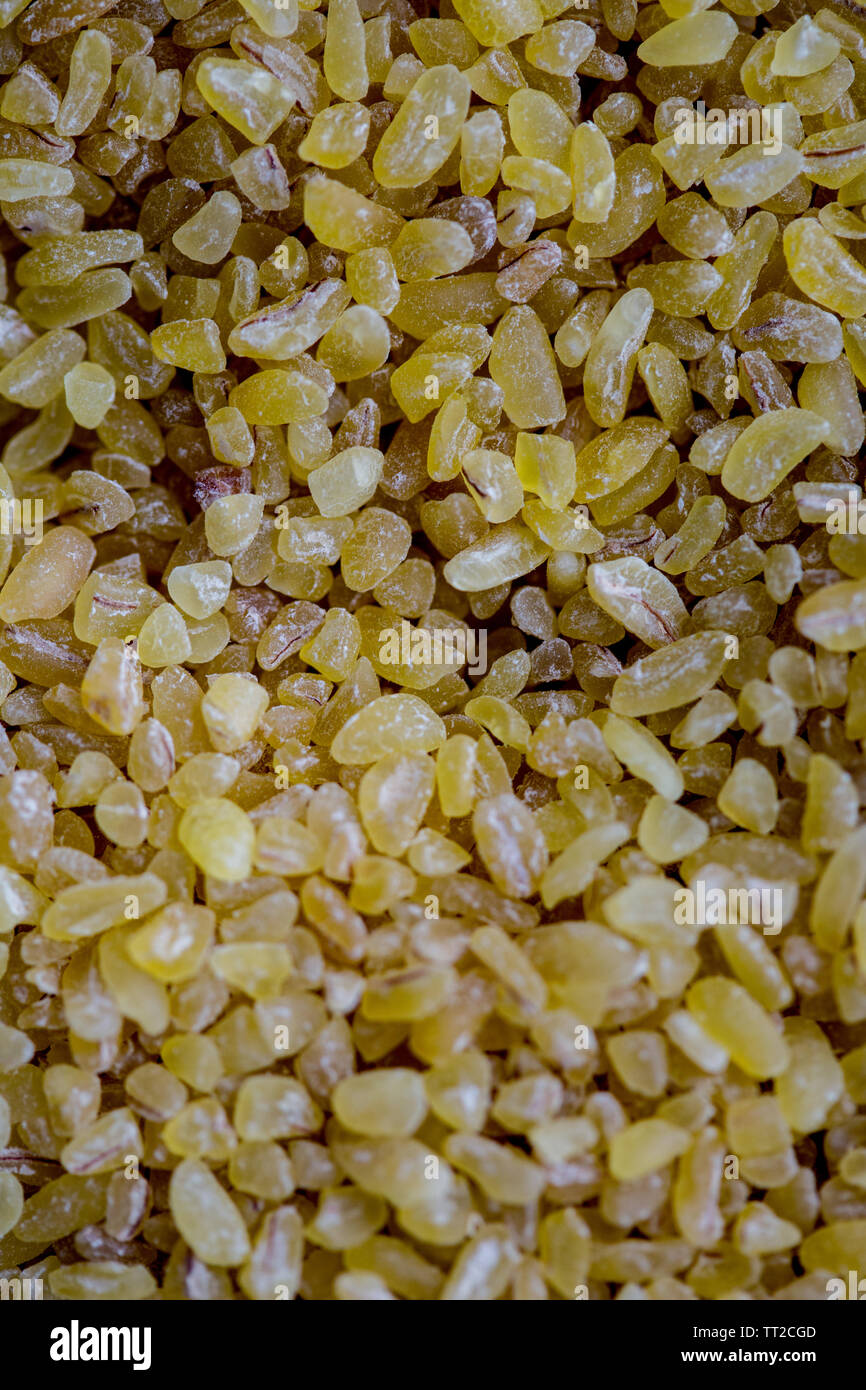 cracked wheat rice pattern texture uncooked Stock Photo - Alamy