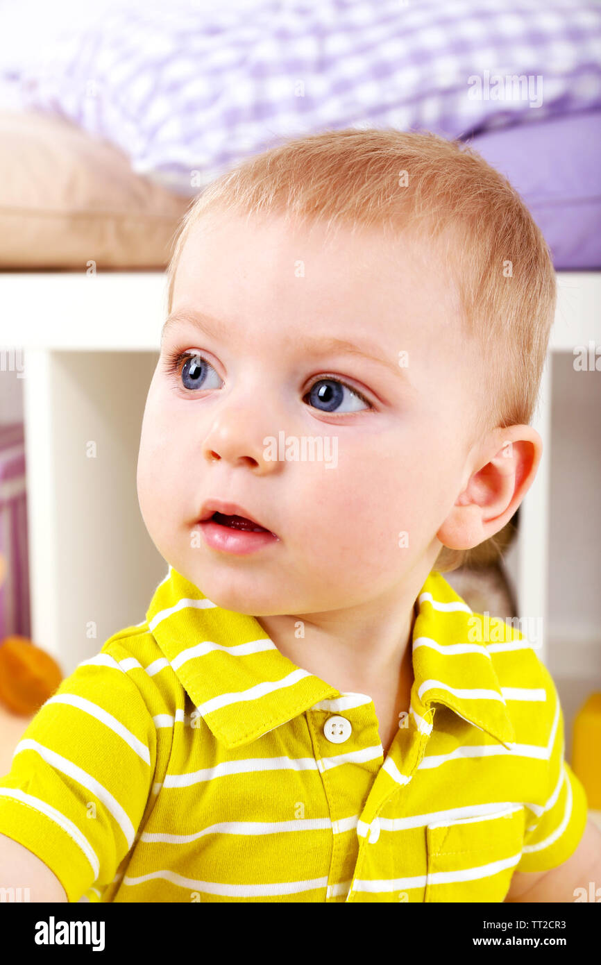 Cute little boy in room Stock Photo - Alamy
