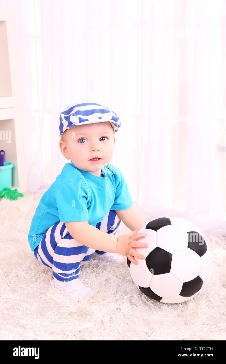 Newborn baby boy in football hi-res stock photography and images - Alamy