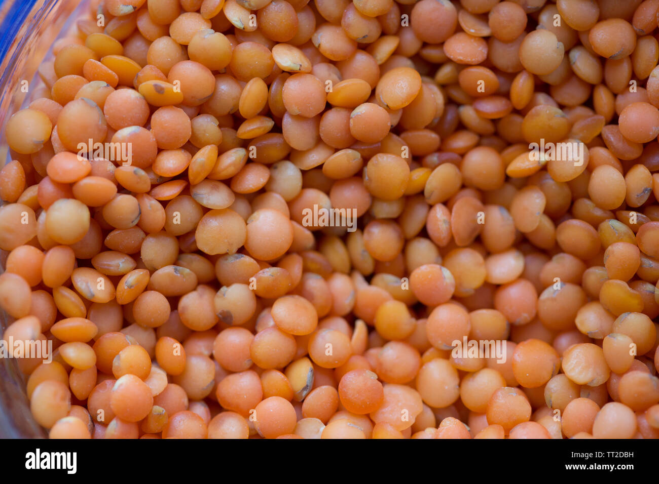 red lentil raw uncooked macro texture pattern Stock Photo - Alamy