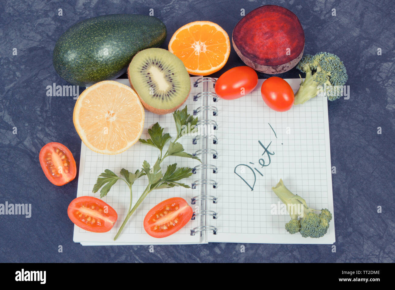 Natural fruits with vegetables as source vitamins and notepad with word ...