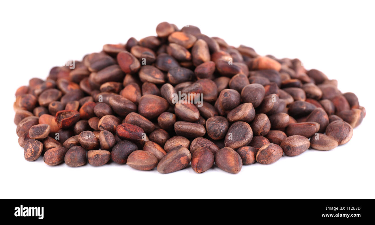 Cedar pine nuts isolated on white Stock Photo - Alamy